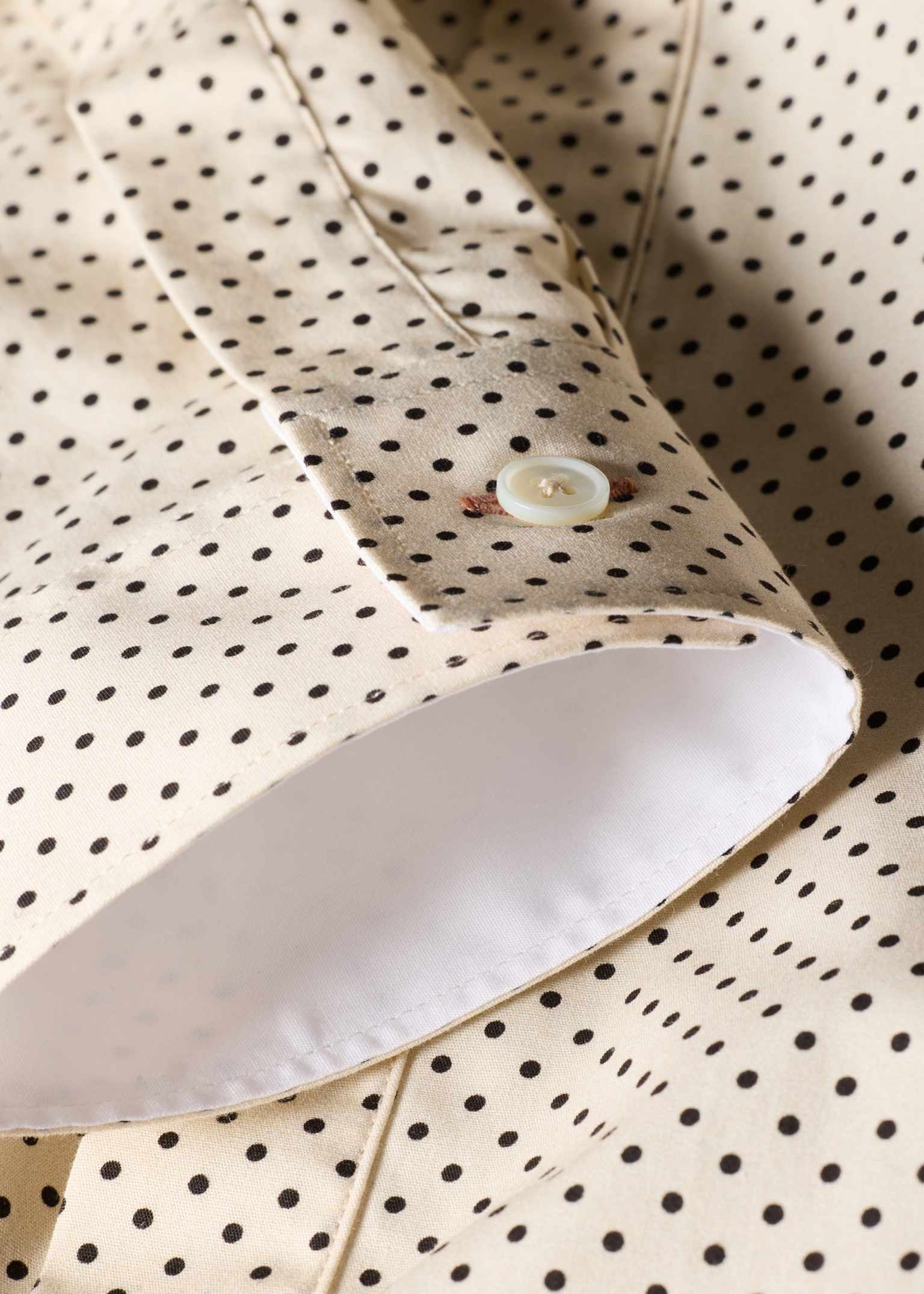 white shirt with dot pattern