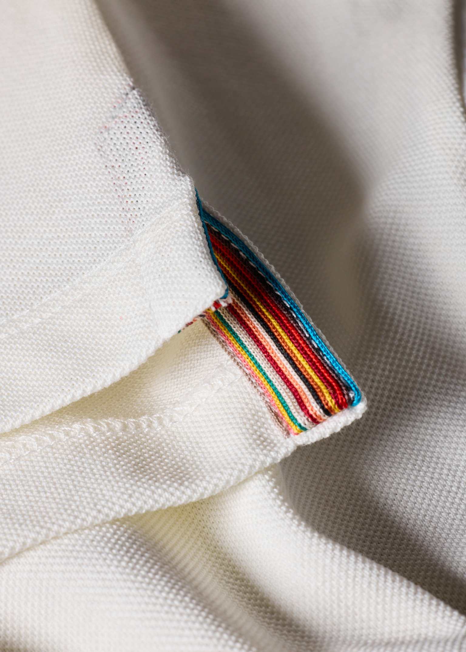 Men's White Polo Shirt with Embroidered 'Rabbit' Placket